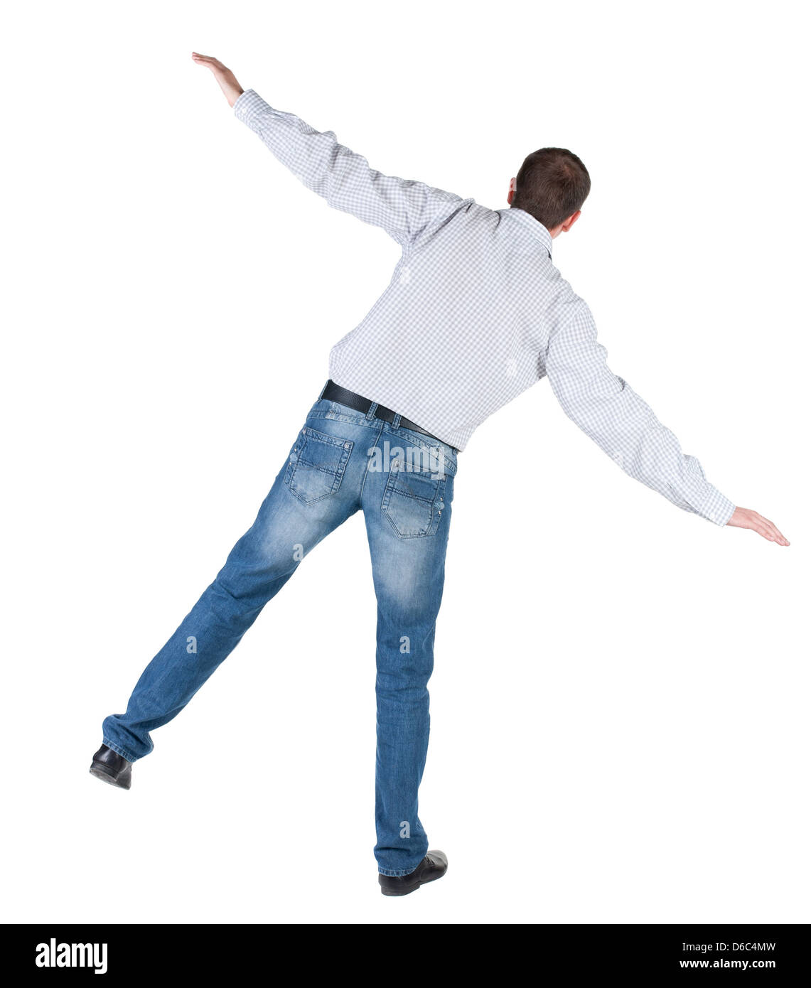 Balancing man in shirt . Rear view. Isolated over white background ...