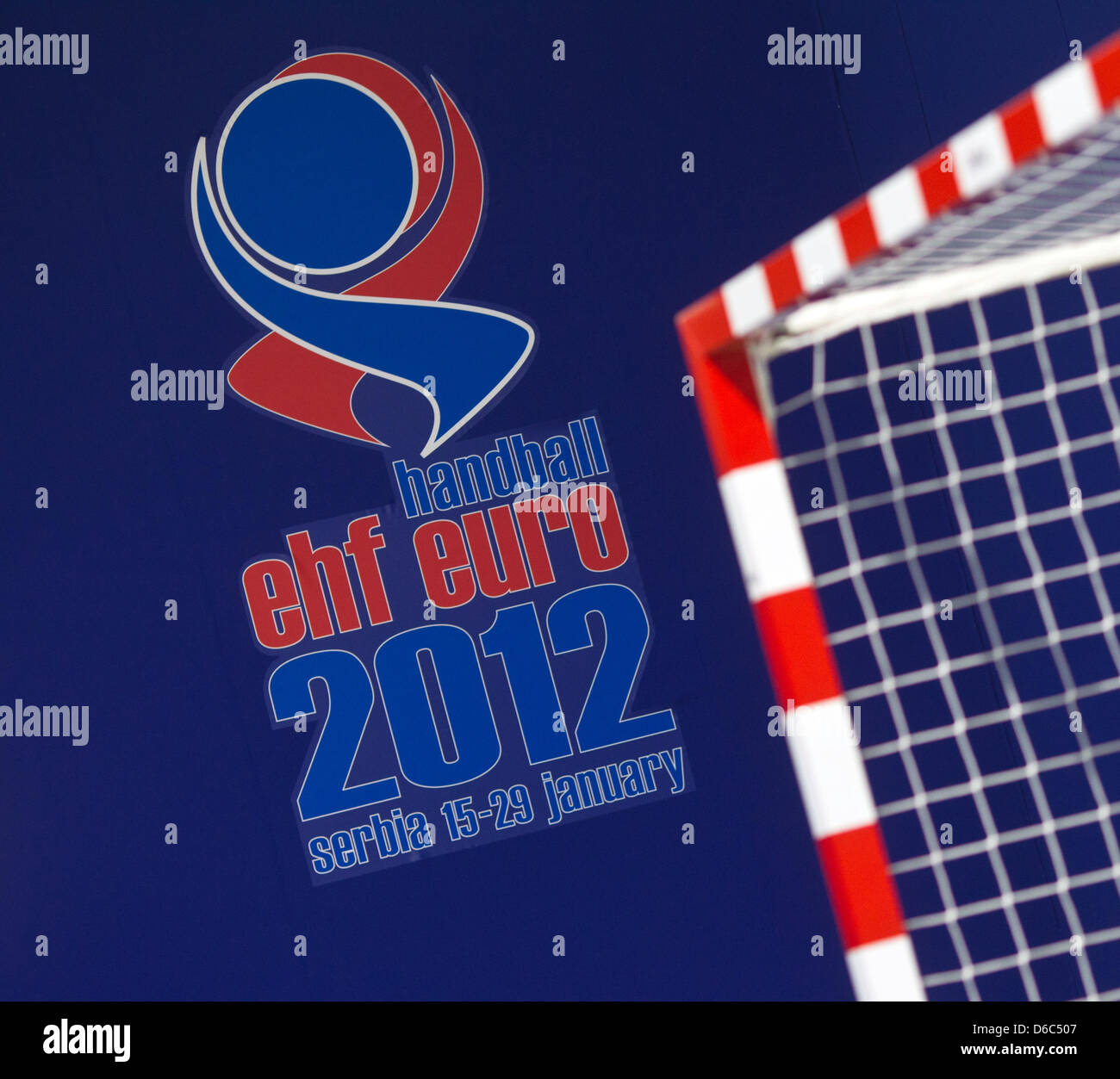 The logo of the European Handball Championships hangs next to a goal on ...