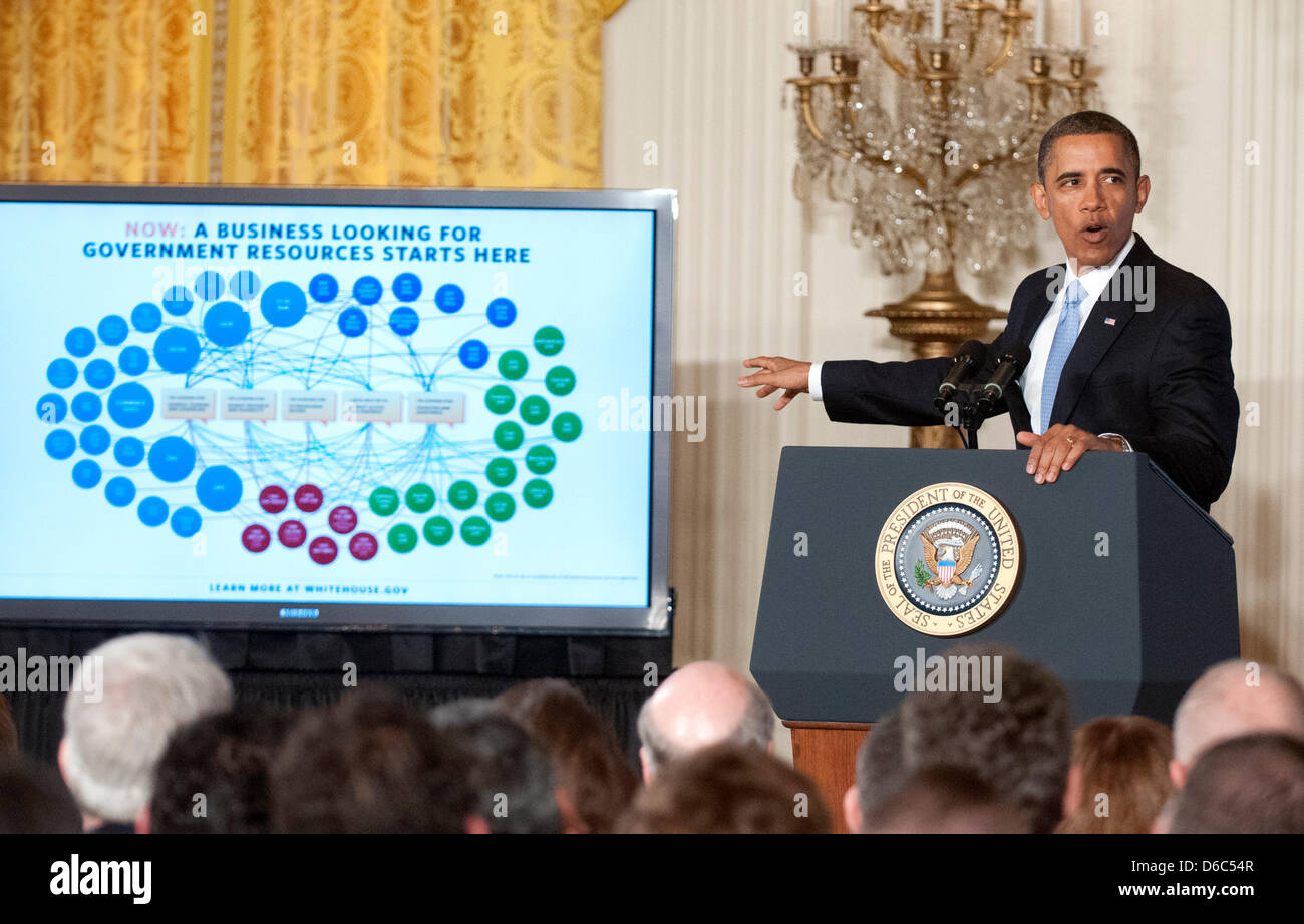 United States President Barack Obama gestures towards a chart as he ...