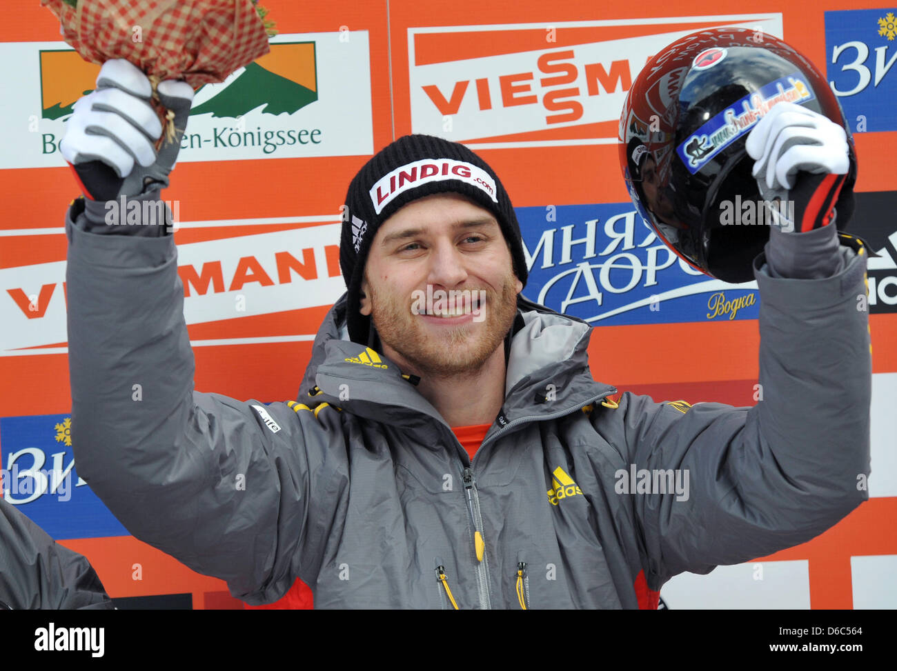 German skeleton pilot Frank Rommel cheers after winning the Skeleton ...
