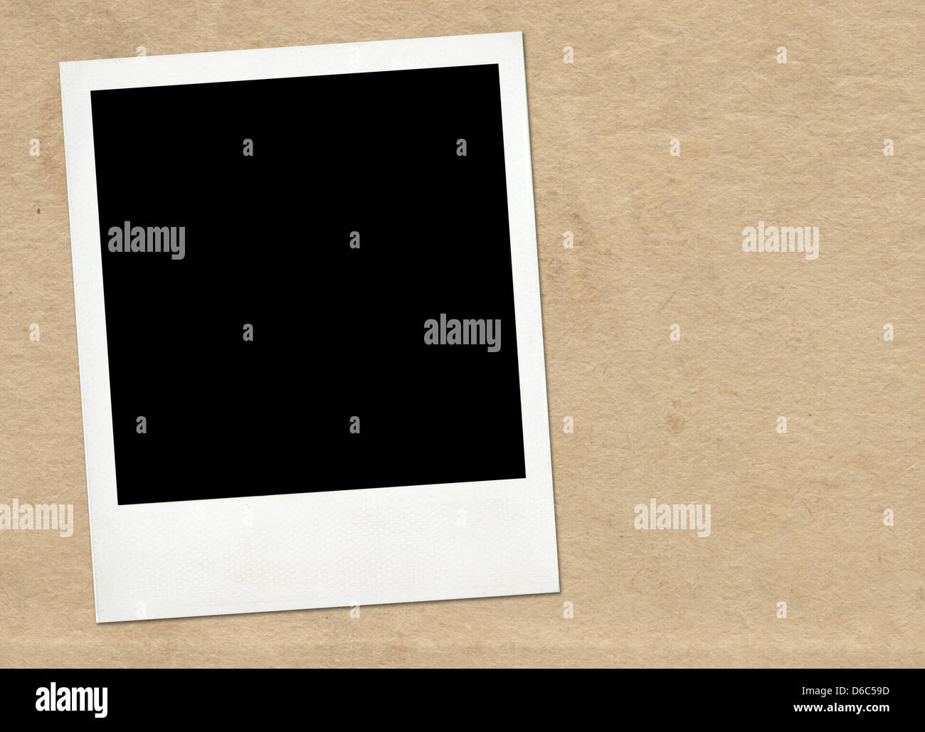 Instant frame on old paper background Stock Photo - Alamy