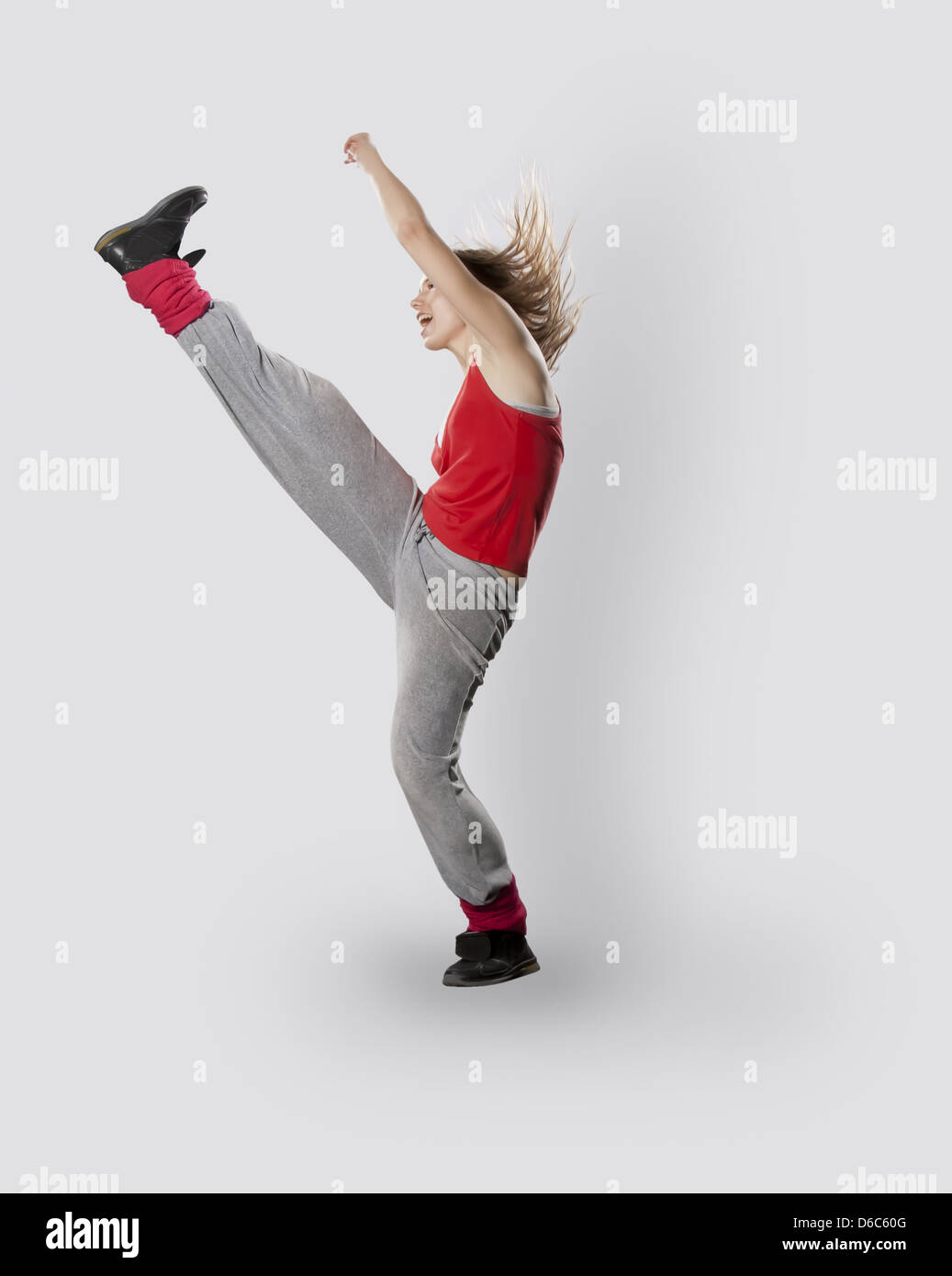 Teenage girl dancing breakdance in action Stock Photo - Alamy