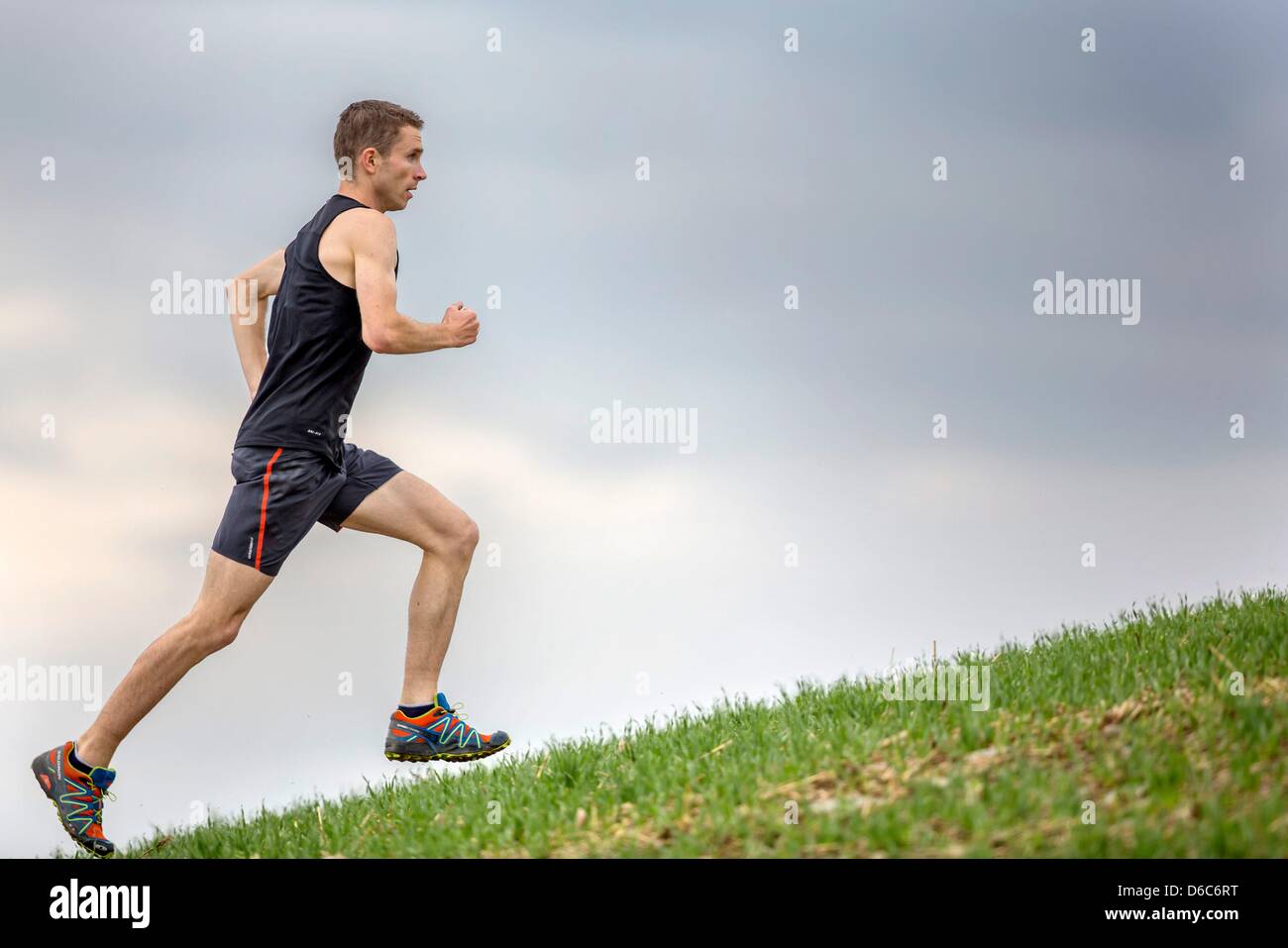 The long-distance alpine runner Christian Seiler practices near his ...