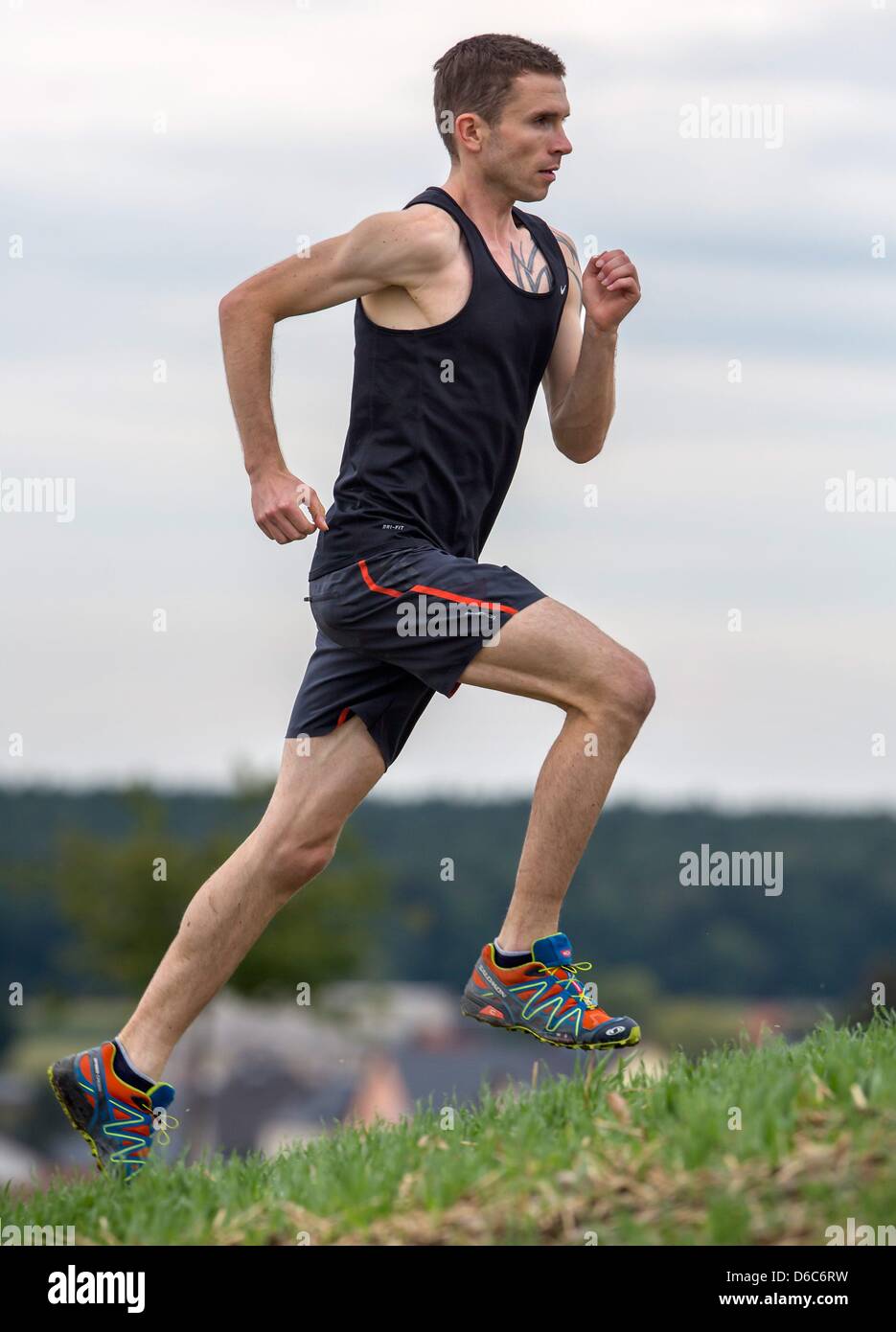 The long-distance alpine runner Christian Seiler practices near his ...