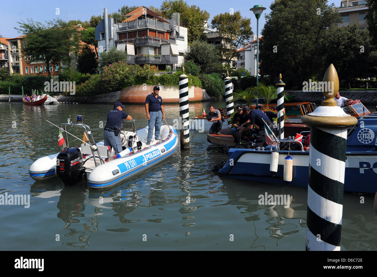 Italian Police and water guard are in front of the hotel Excelsior for ...