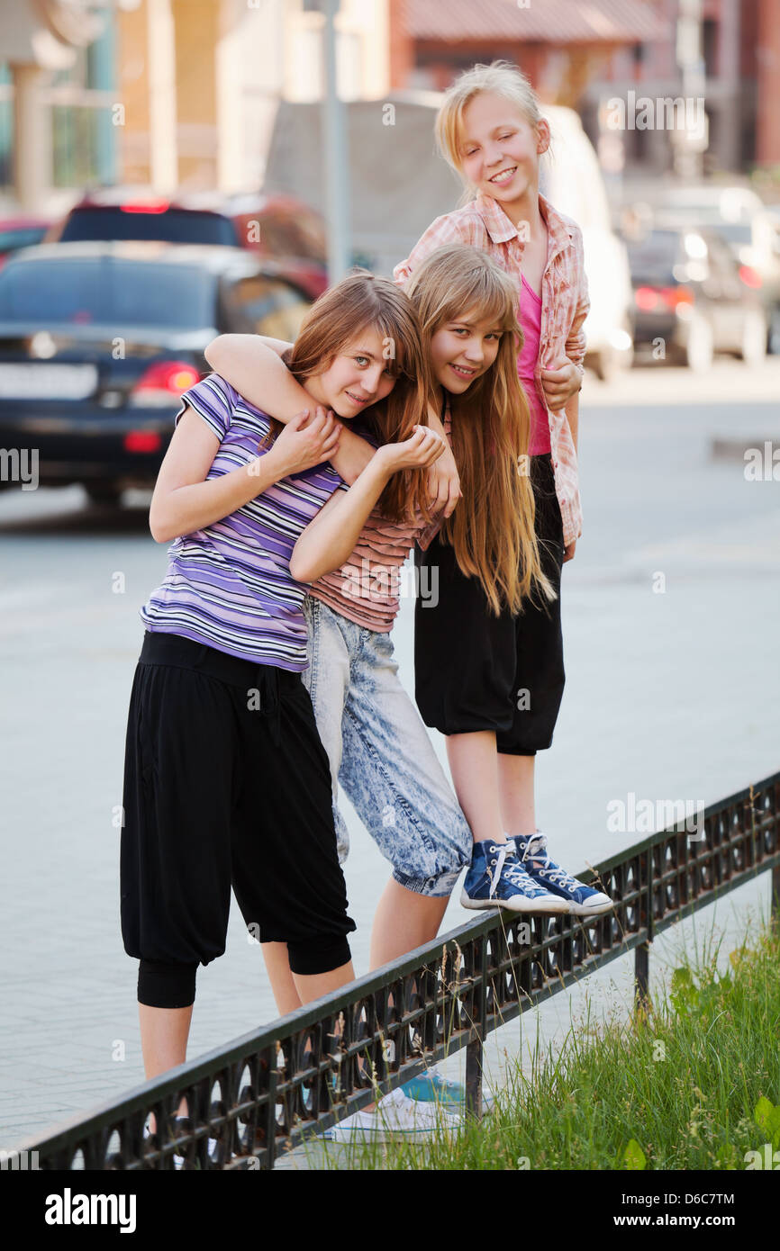 Teenage girls on a city street Stock Photo - Alamy