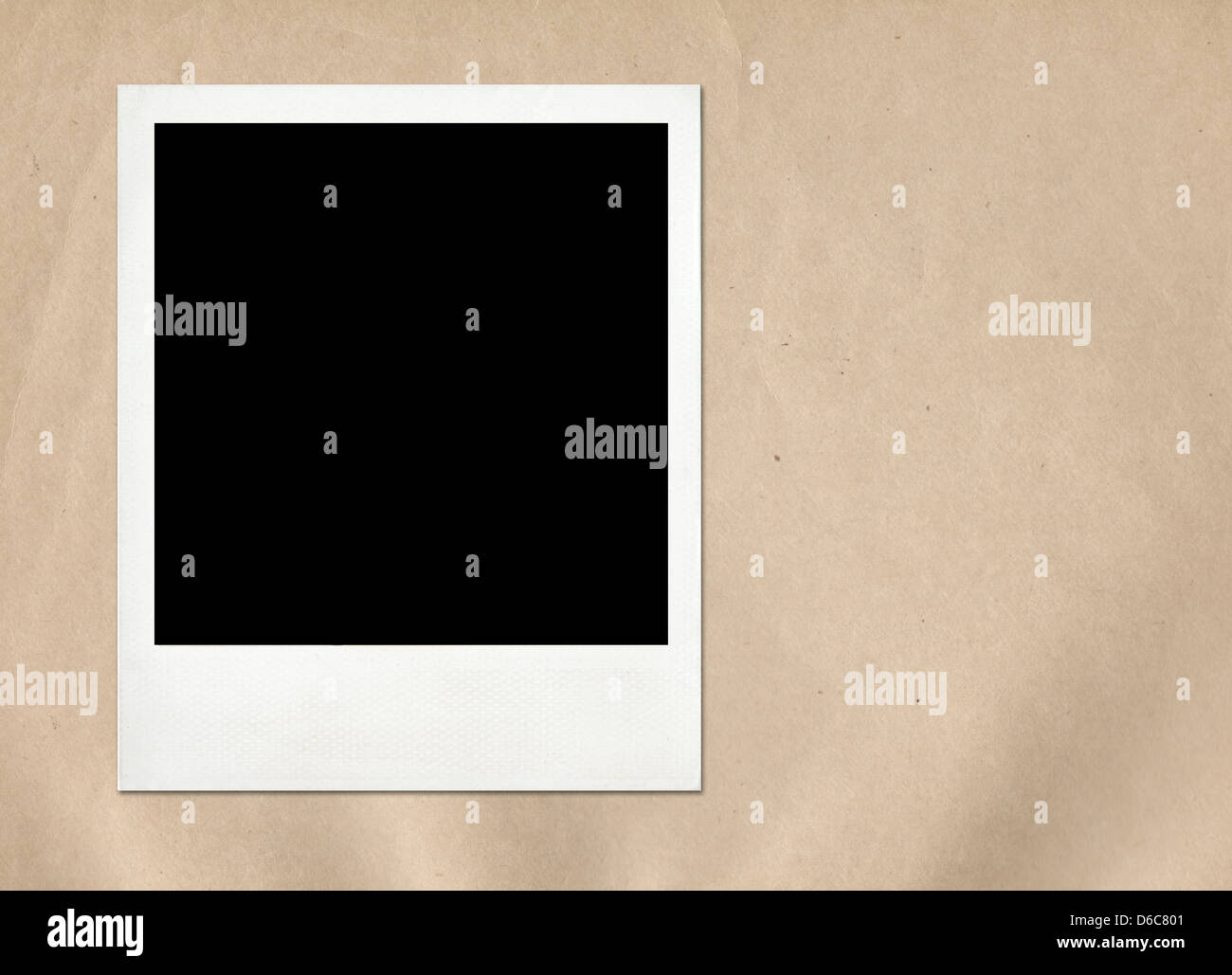 Instant frame on old paper background Stock Photo - Alamy