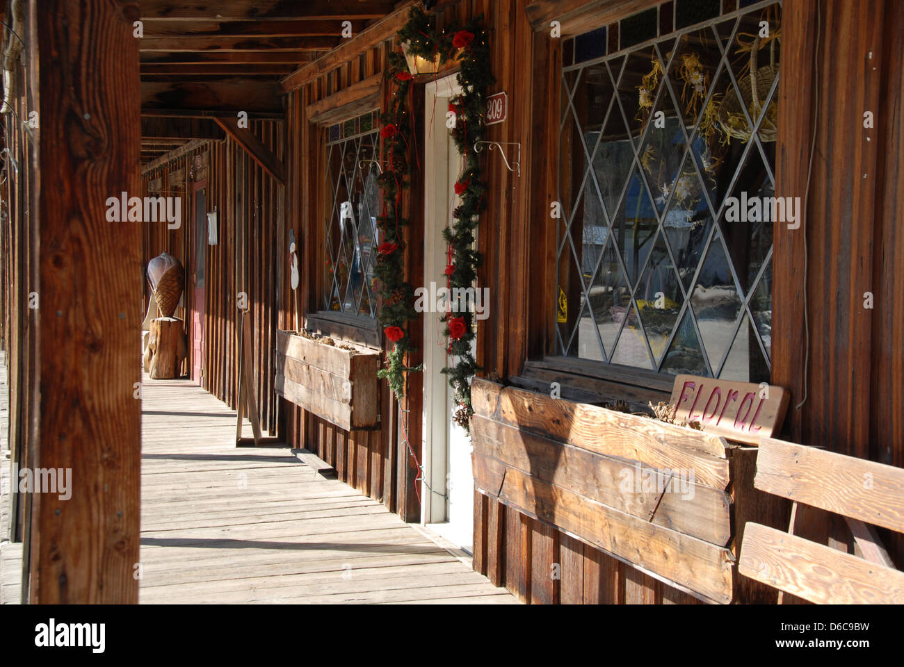 Wooden boardwalk, covered and storefront, Idaho City. Idaho Stock Photo ...