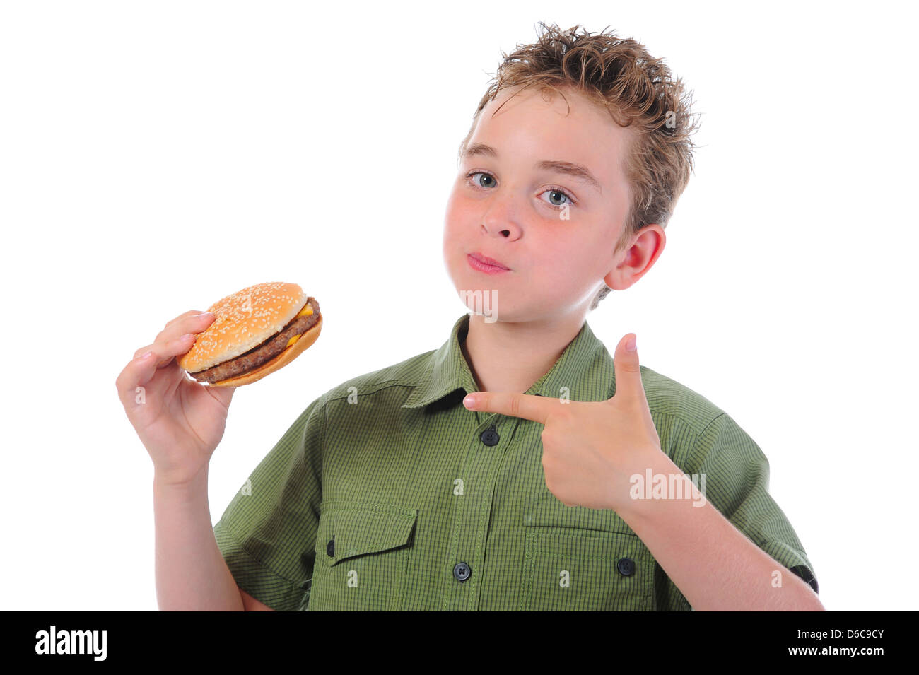 Little boy eating a hamburger Stock Photo - Alamy