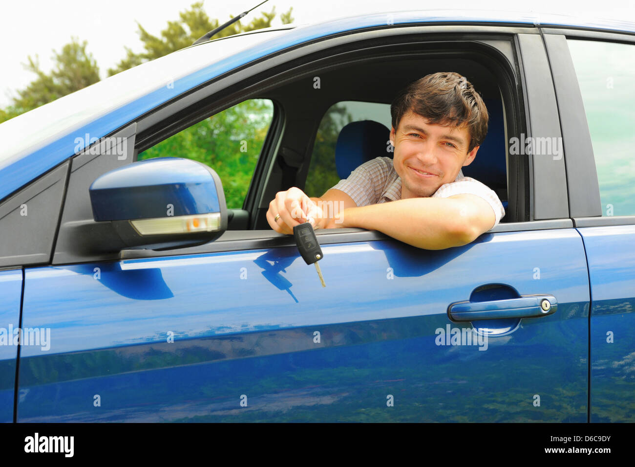 man showing the keys Stock Photo - Alamy