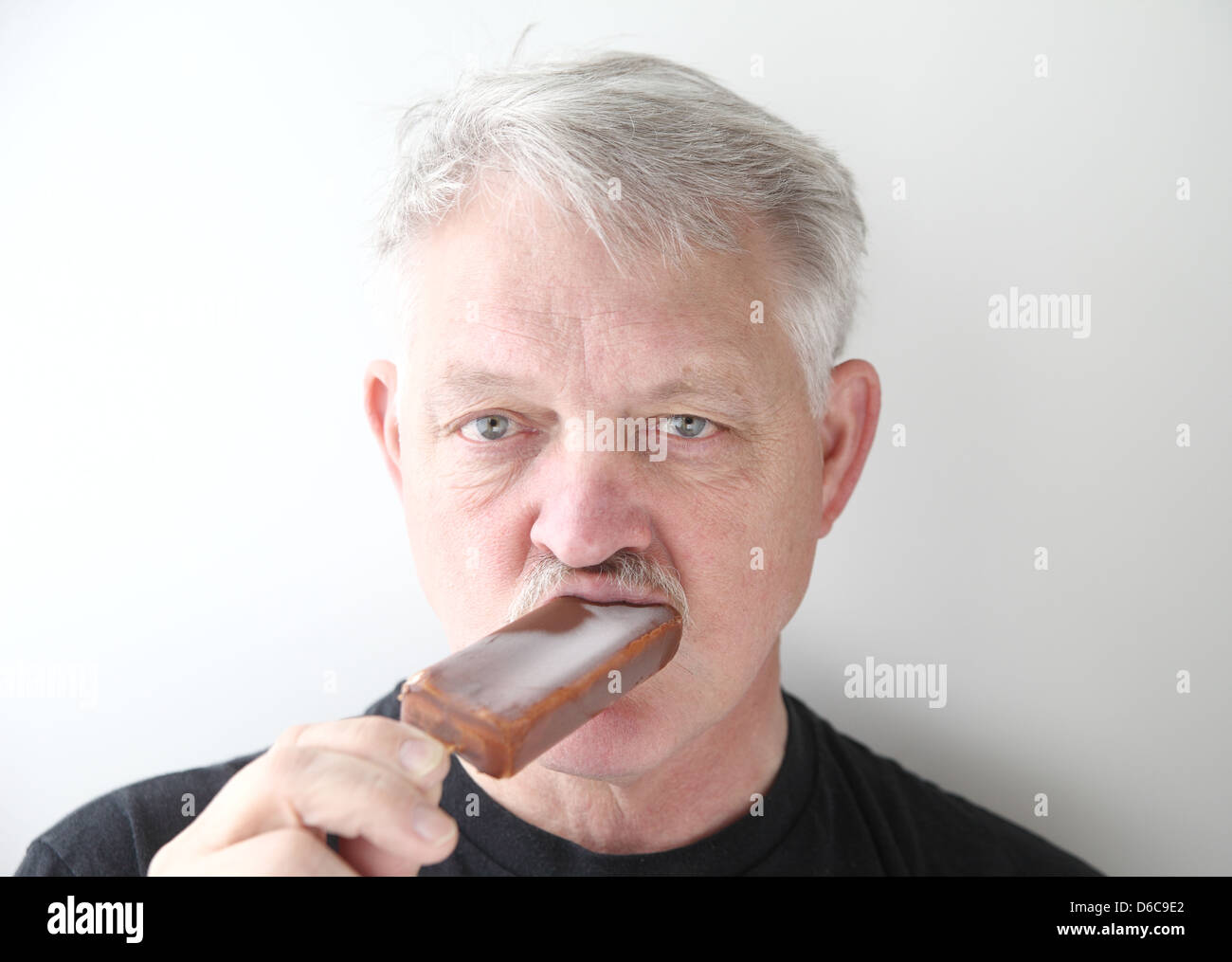 senior man enjoys a cold, sweet treat Stock Photo - Alamy senior man enjoys a cold, sweet treat Stock Photo - Alamy