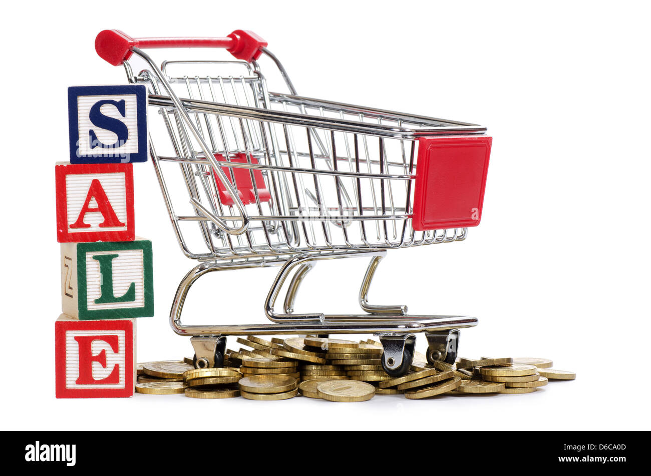 shopping cart and coins Stock Photo - Alamy