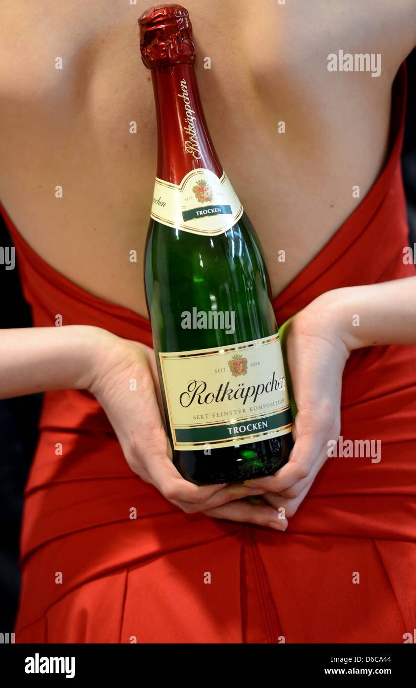 A model holds a bottle of Rotkaeppchen sparkling wine during a press ...