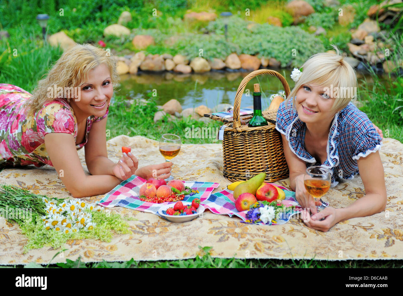Young women in a park Stock Photo - Alamy