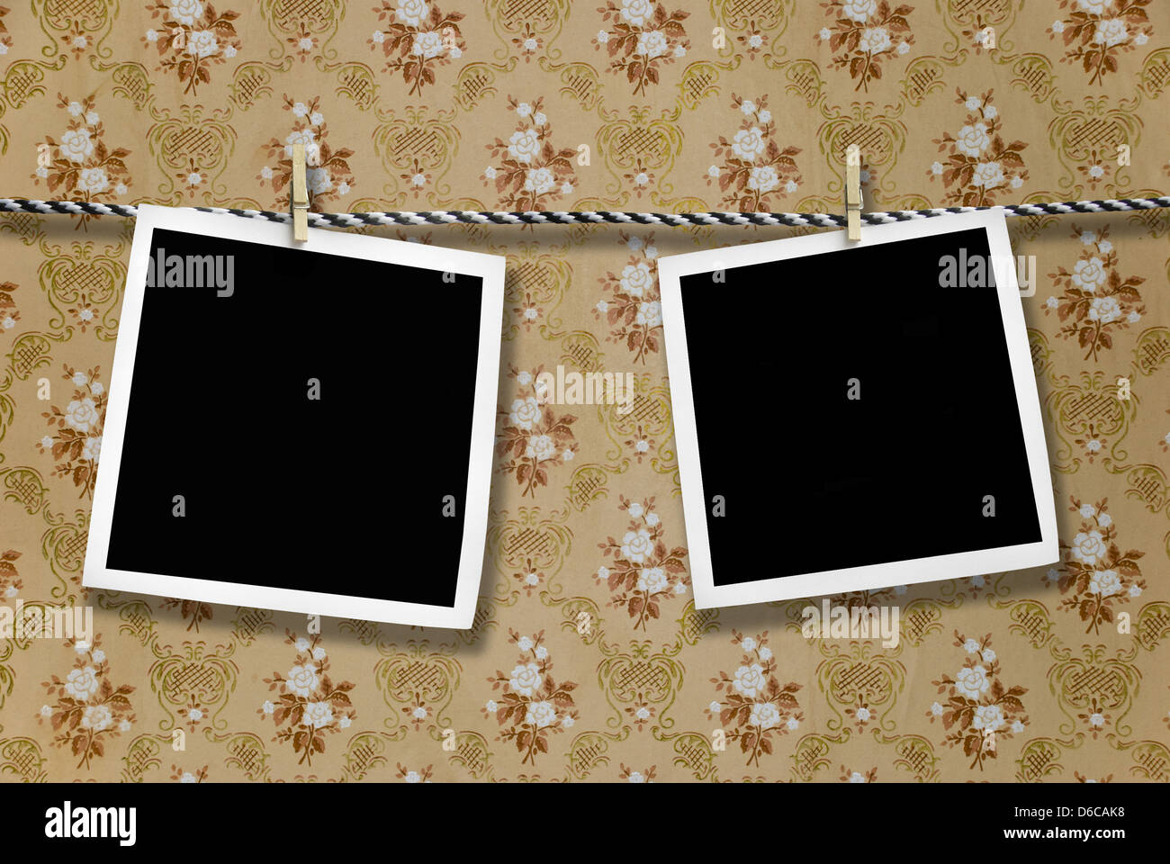 vintage photos on a rope Stock Photo - Alamy