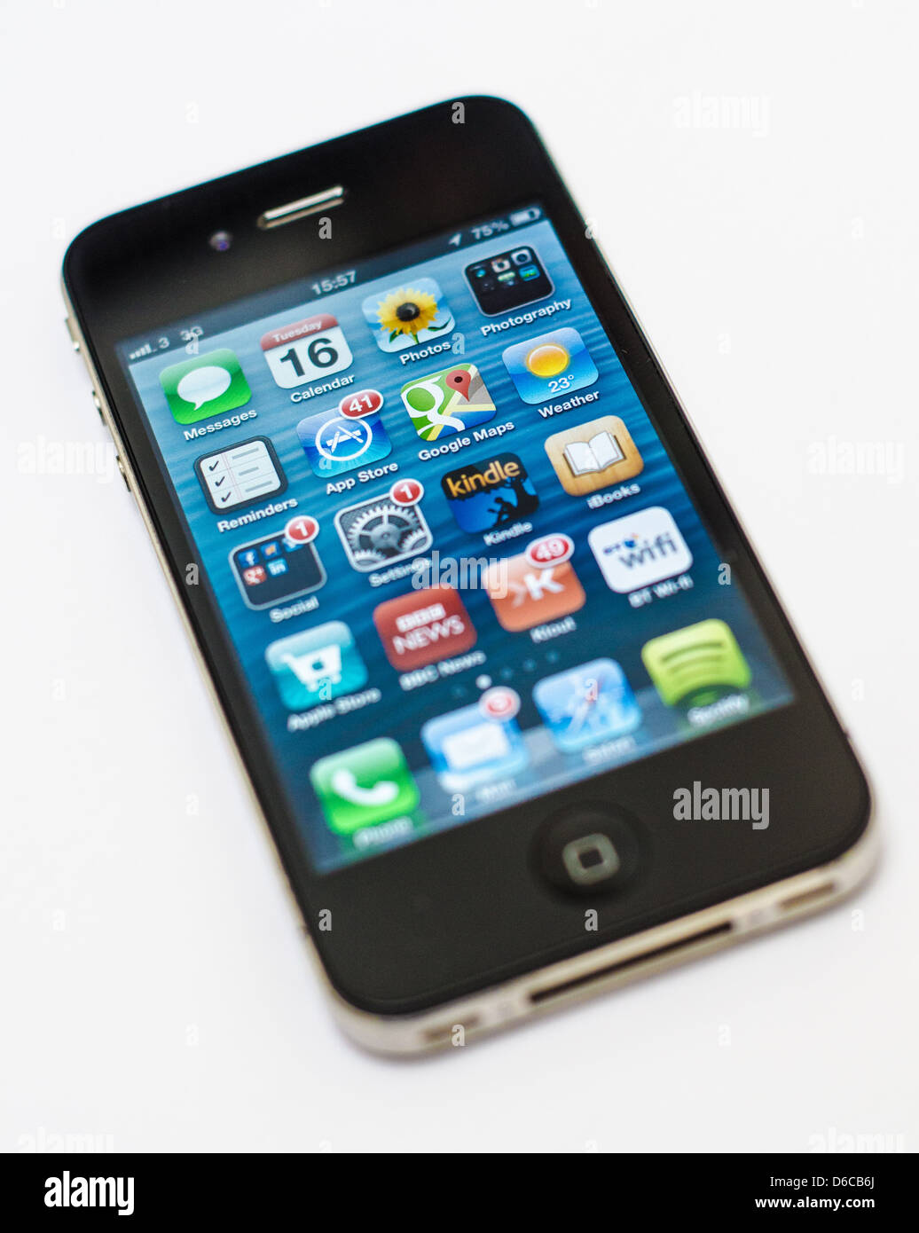 Apple iPhone on white background showing homescreen and a variety of ...