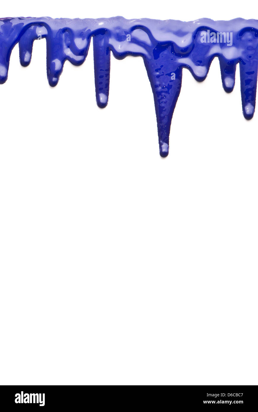 Blue paint pouring on white background Stock Photo - Alamy