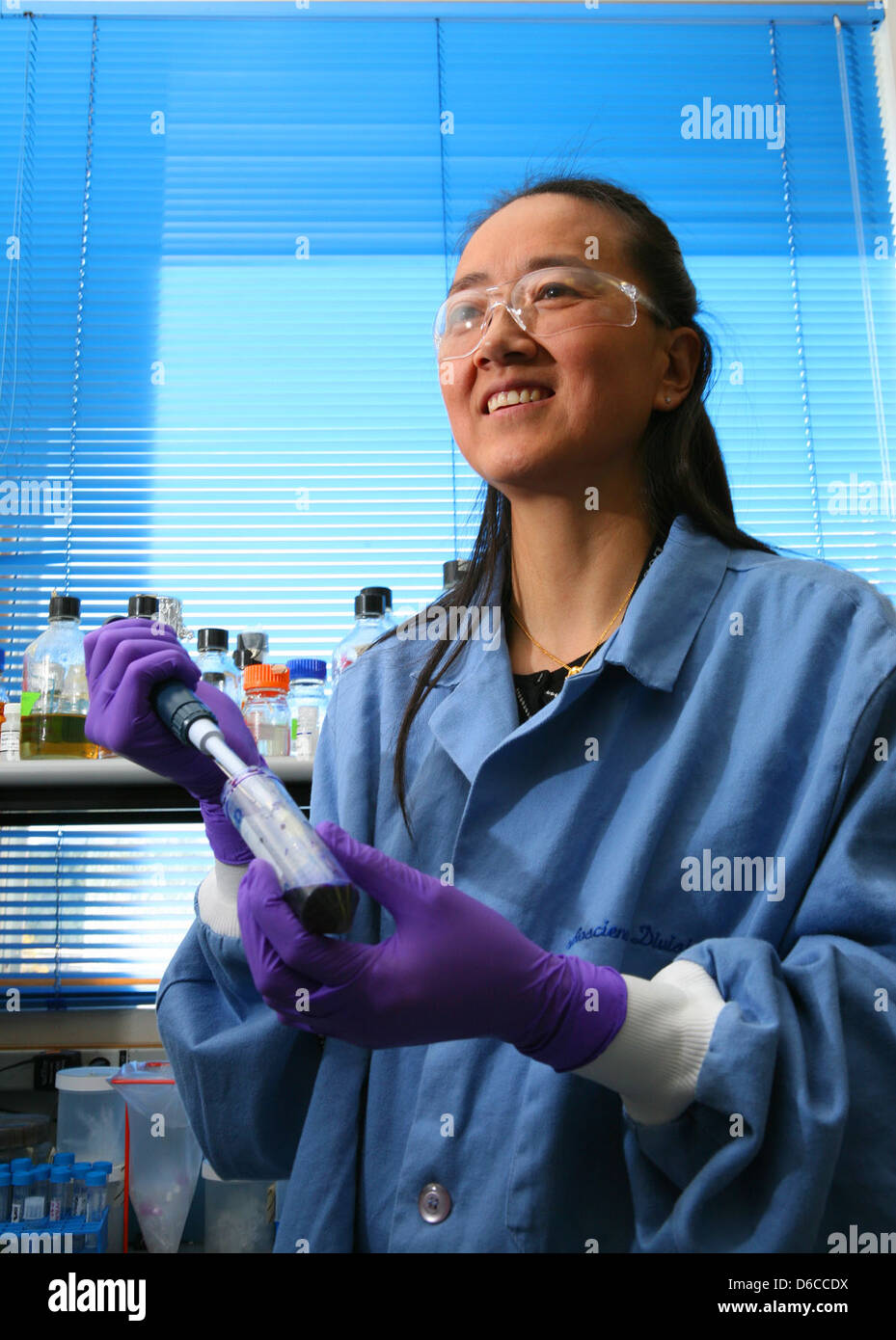 This photograph features Dr. Xiaoyun Lu of the Bioscience Division at ...