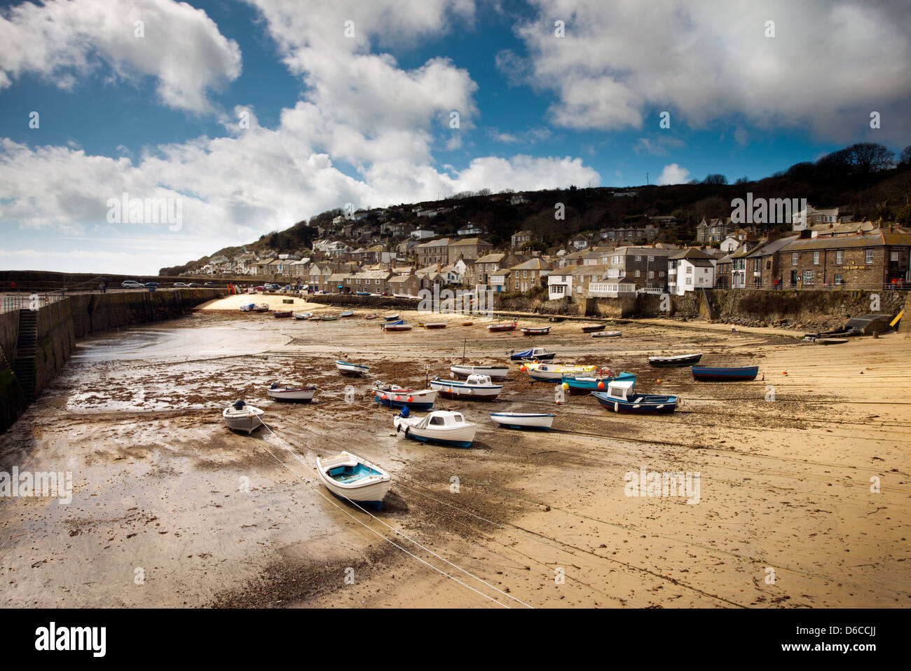 Mousehole harbour at low tide, Cornwall Stock Photo - Alamy