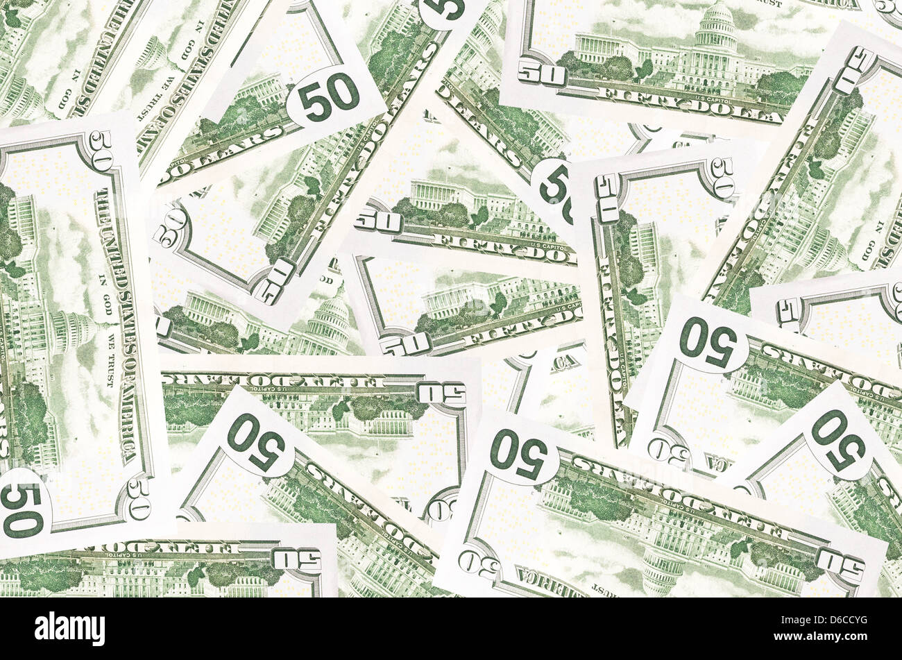 A stack of fifty 50 dollar bills fanned out with the back US Capitol ...