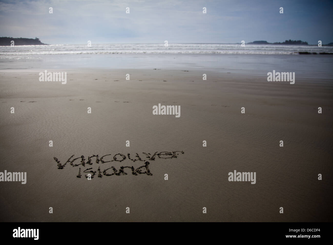 Sand writing on Vancouver Island beach Stock Photo - Alamy