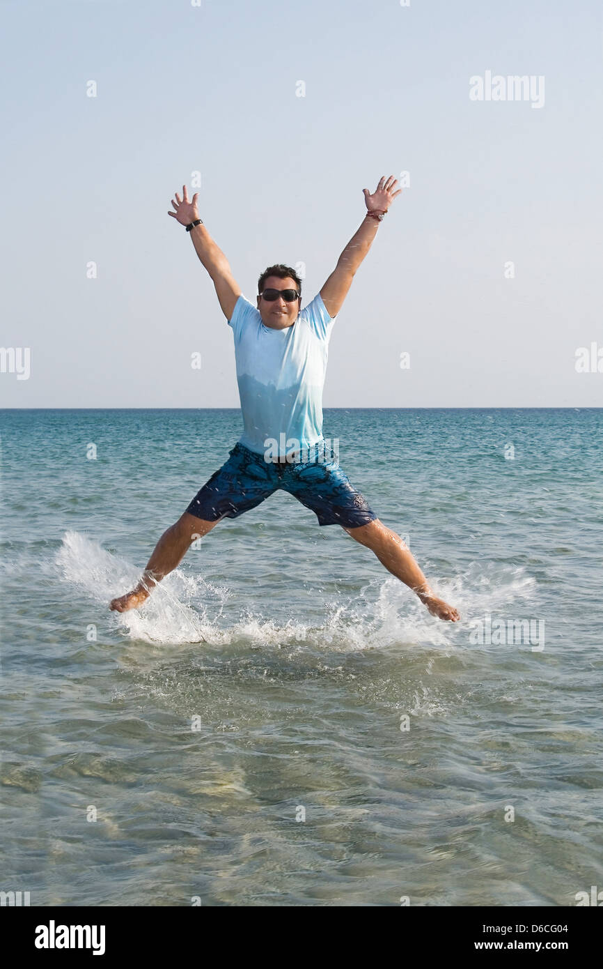 Boy jumping water from diving hi-res stock photography and images - Alamy