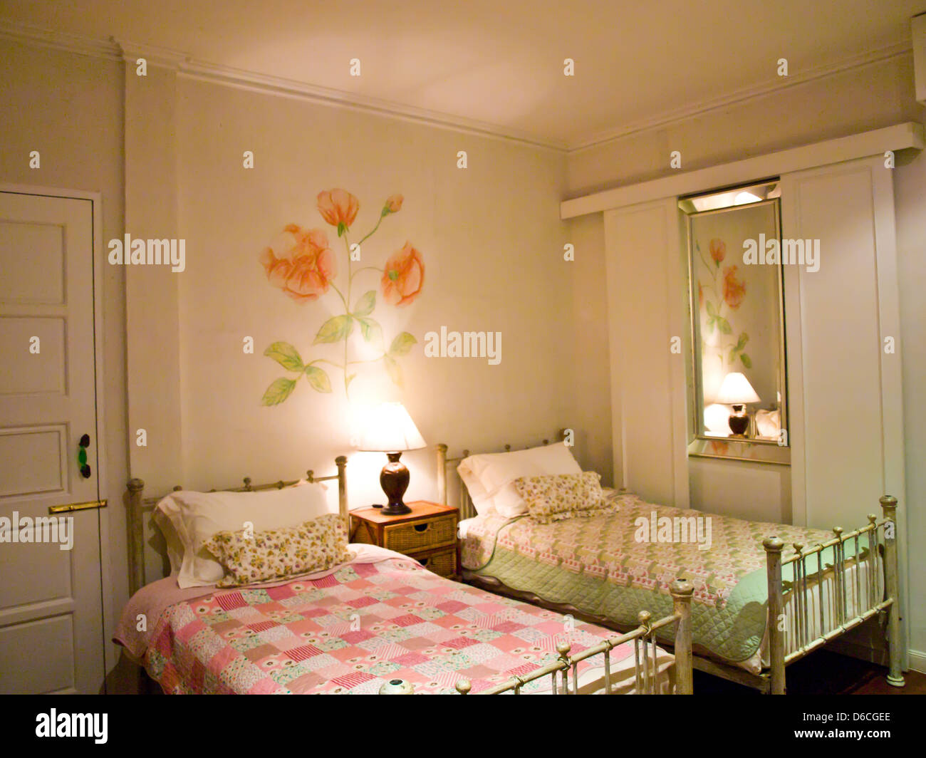 Twin bedroom with roses fresco decoration Stock Photo - Alamy