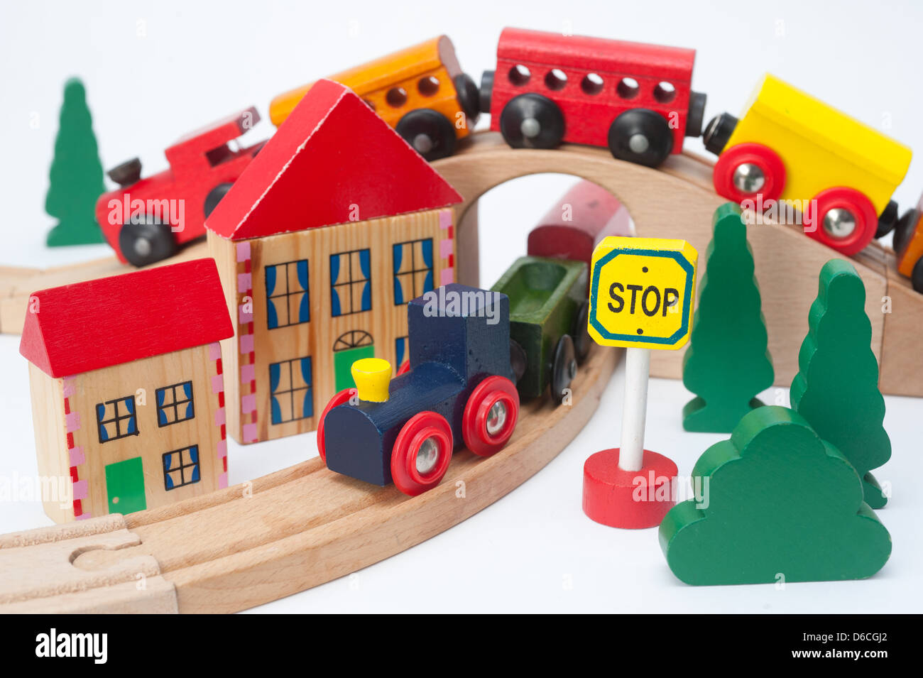 Wooden toy train set with stop sign Stock Photo - Alamy