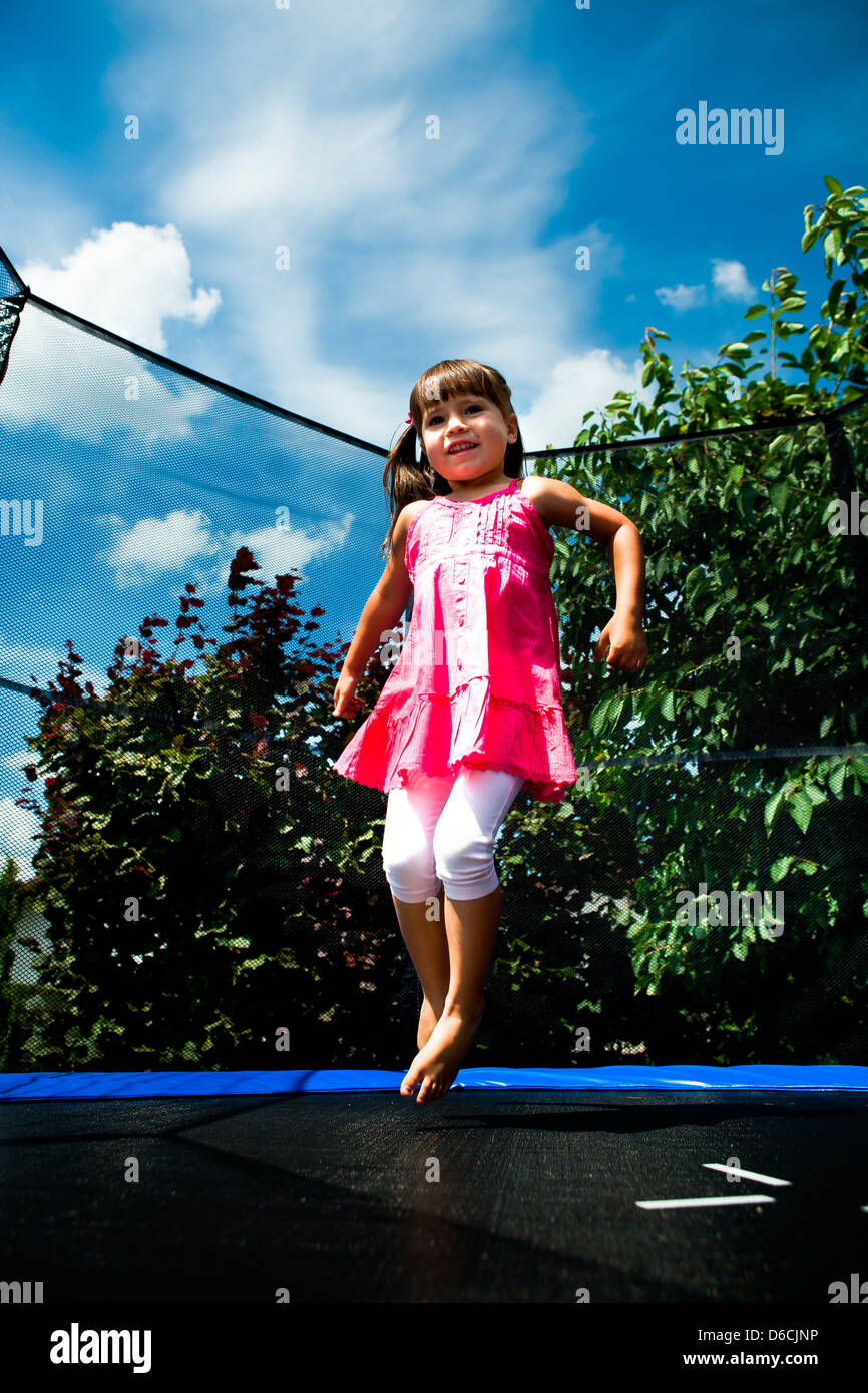 jumping in the garden Stock Photo - Alamy