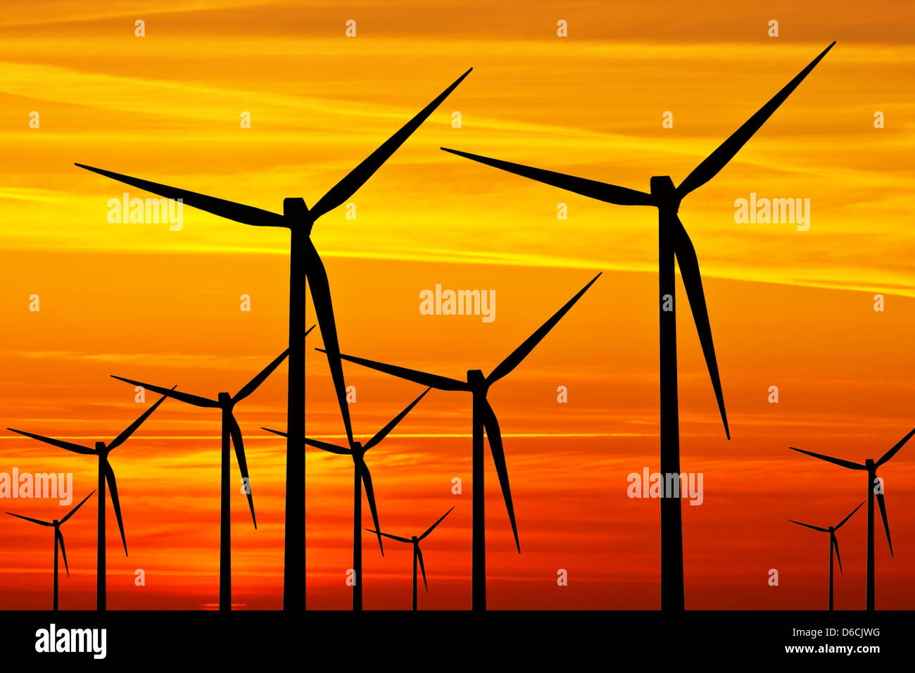 Wind turbines at sunset Stock Photo - Alamy
