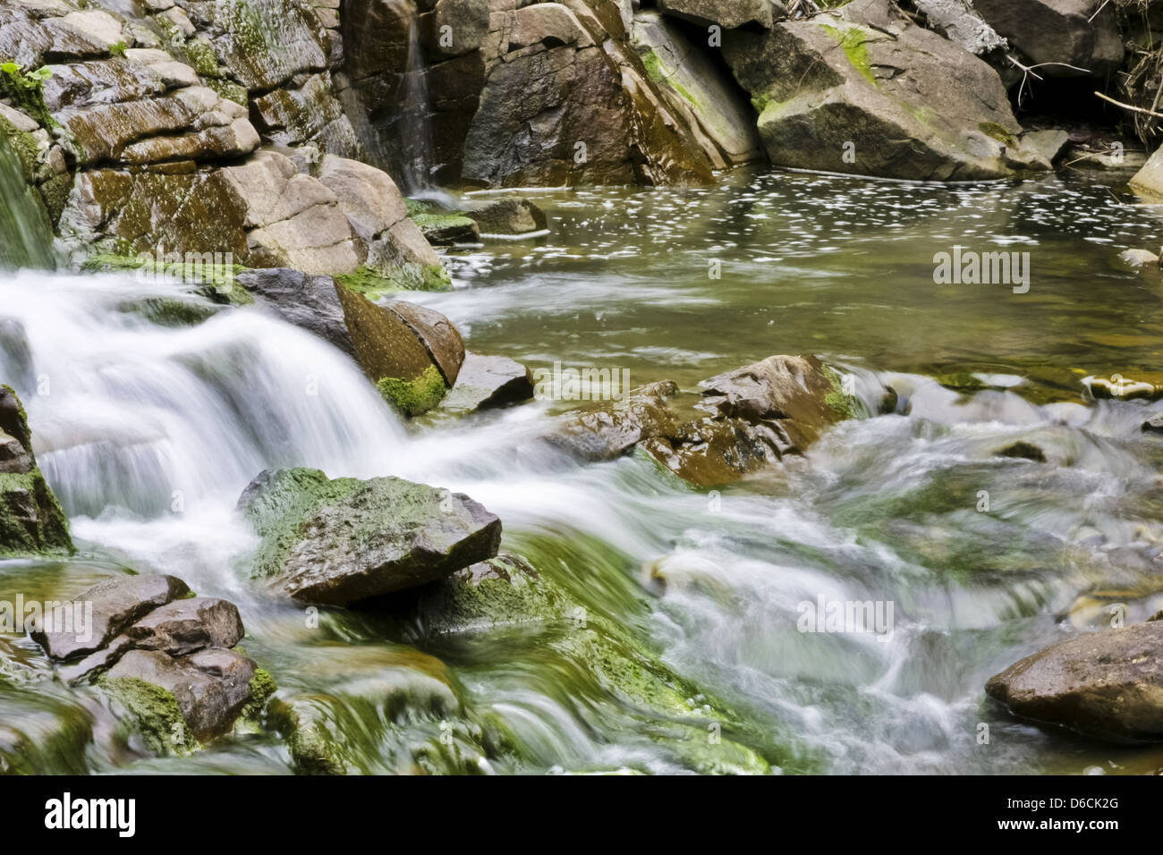 Small stream with waterfalls Stock Photo - Alamy