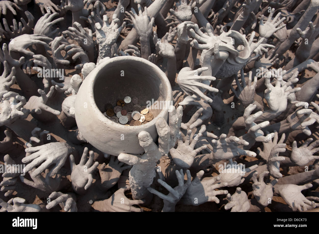 Chiang Rai, Thailand, outstretched hands symbolize the hell Stock Photo ...