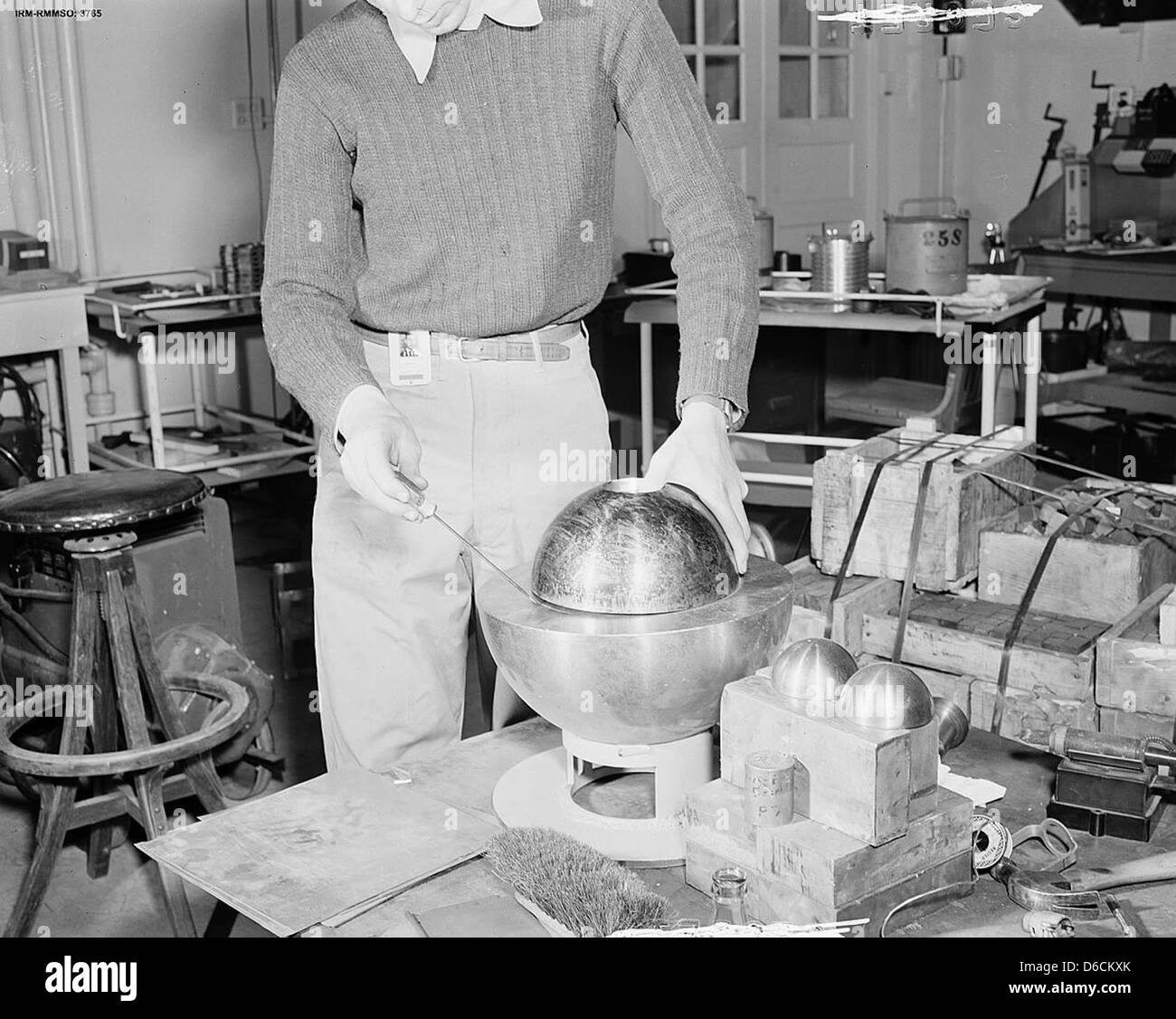 This image shows a mockup of the Slotin accident, a critical incident ...