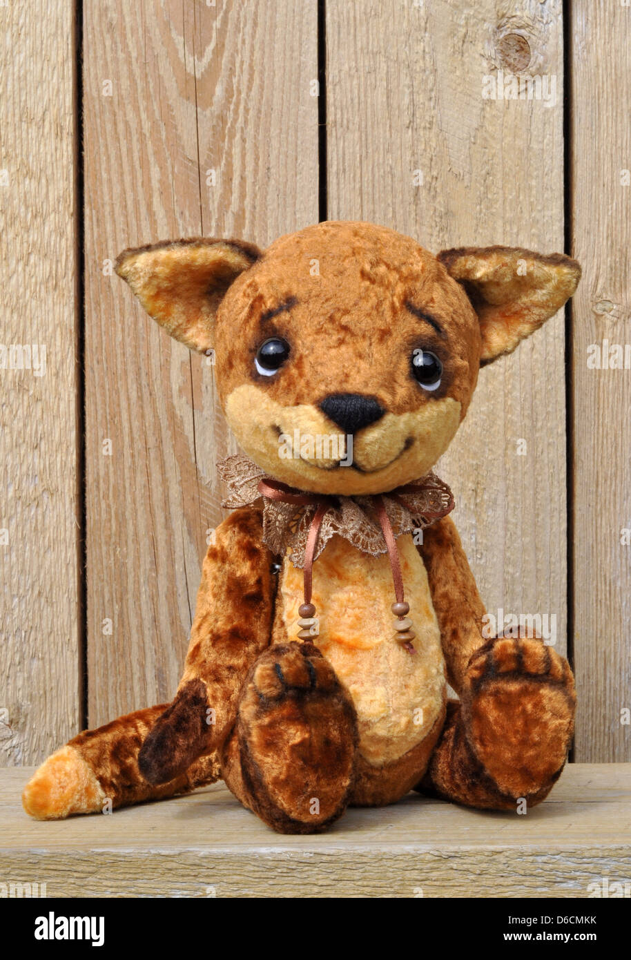 Ron fox on the background of a wooden wall Stock Photo - Alamy