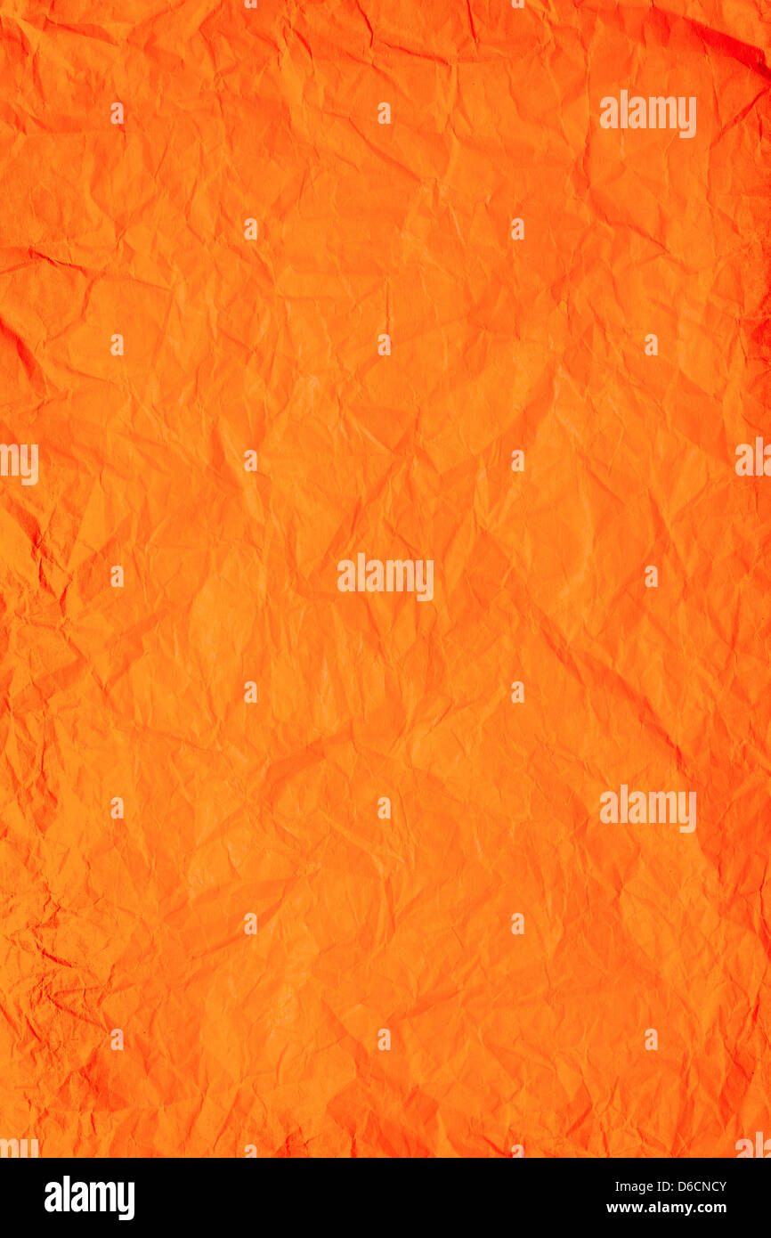 orange crumpled paper background or rough texture Stock Photo - Alamy