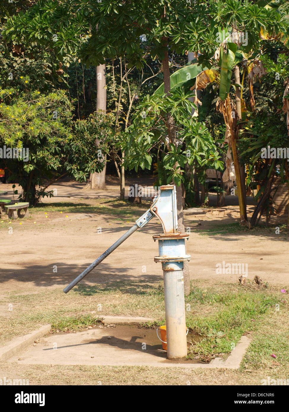 Old rusty groundwater pump Stock Photo - Alamy