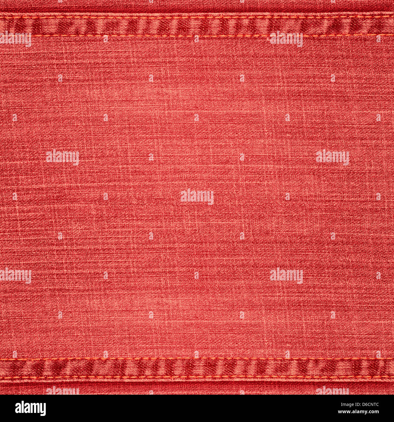 red jeans background with seams or canvas rough texture Stock Photo - Alamy
