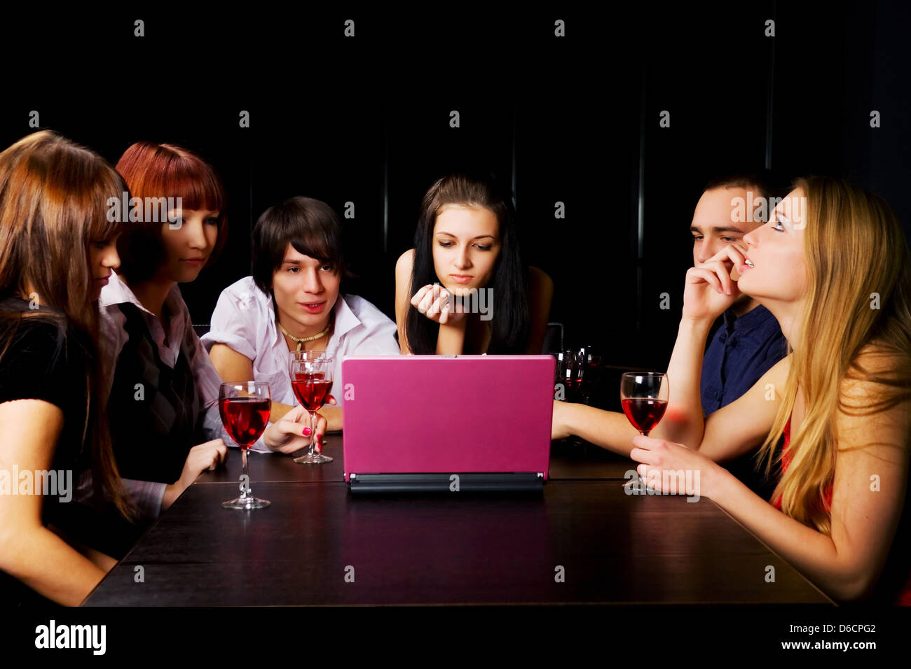 Young people with laptop in a bar Stock Photo - Alamy