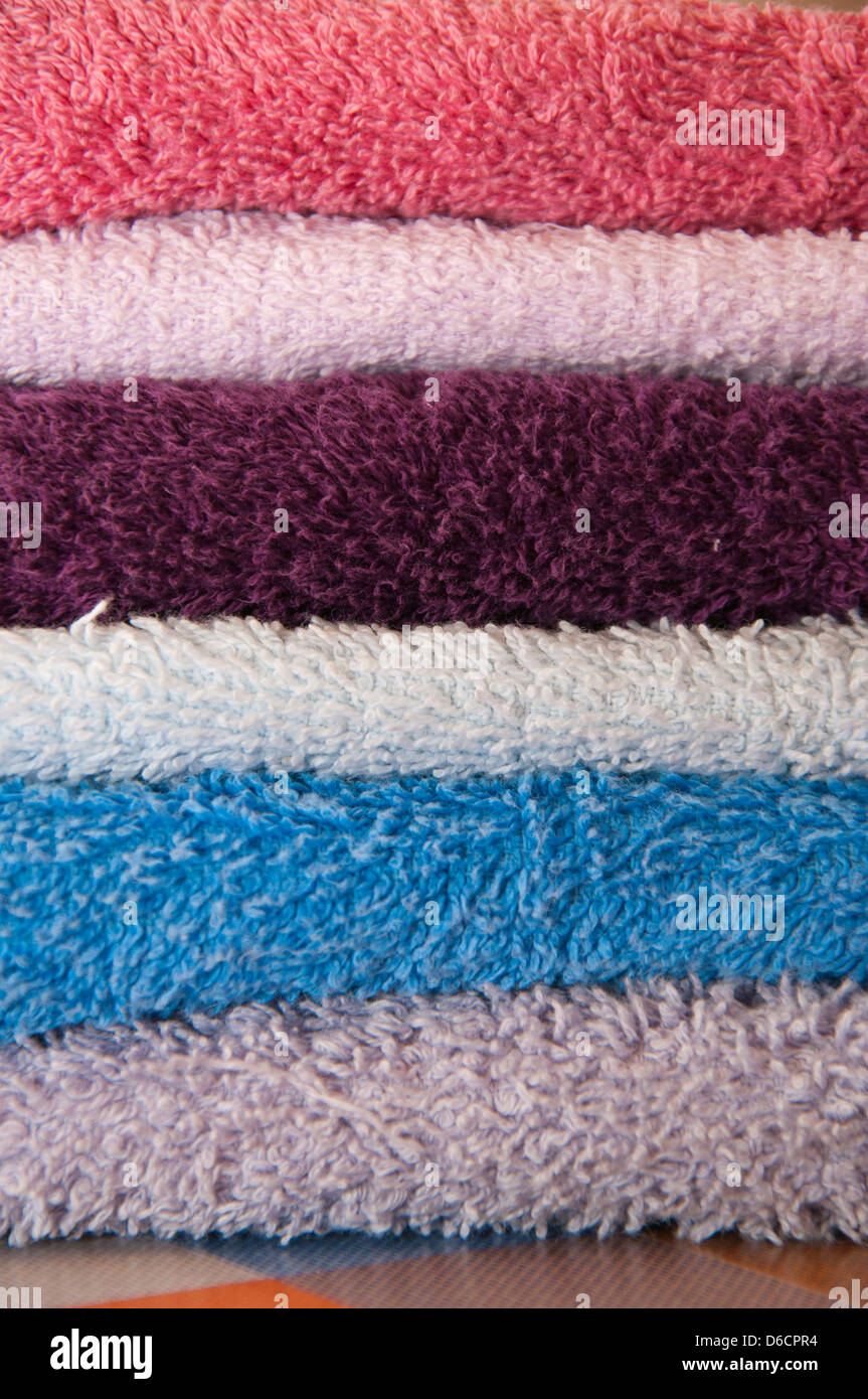 coloured flannels in close up, textures, abstract, colours, stacked ...