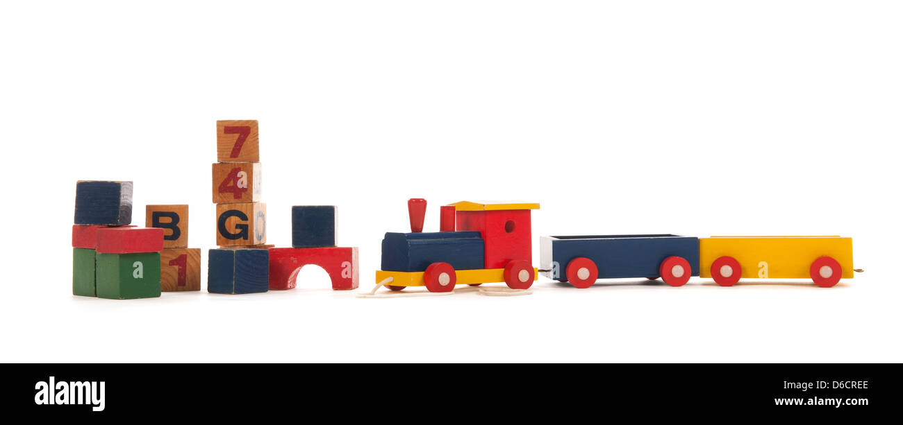 colorful wooden blocks and train Stock Photo - Alamy