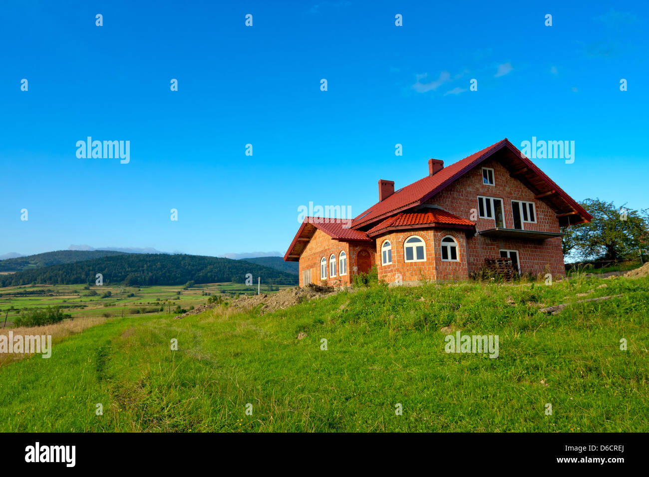 House blue sky cloud hi-res stock photography and images - Alamy