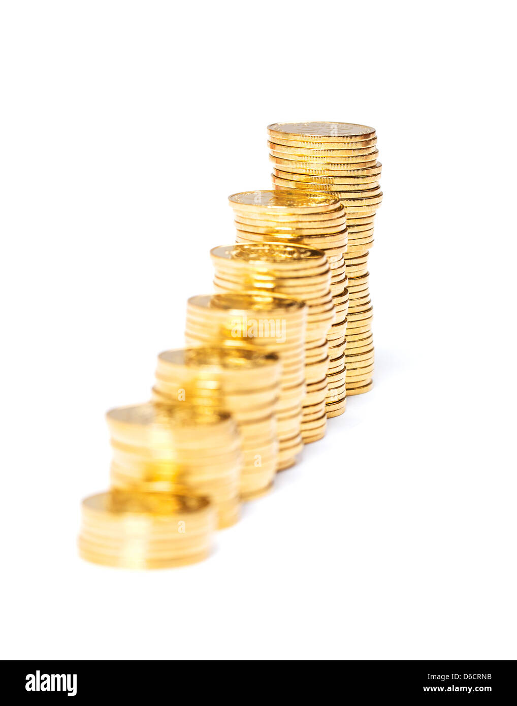 Columns of golden coins isolated on white Stock Photo - Alamy