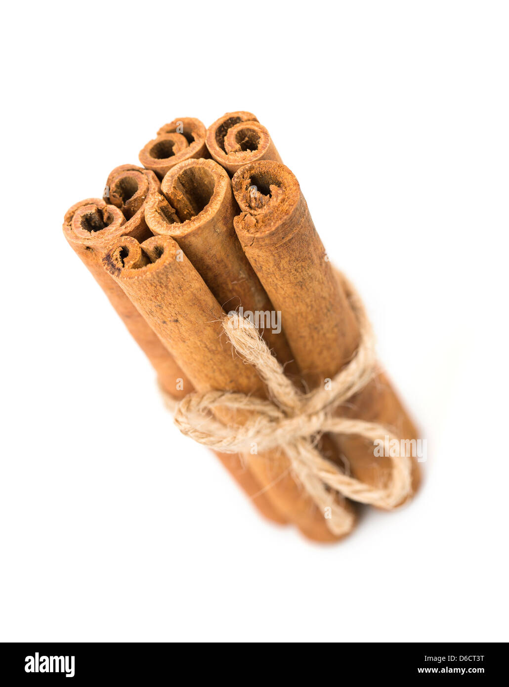 Beam cinnamon roped on a white background Stock Photo - Alamy