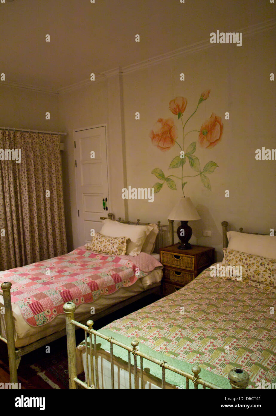 Twin bedroom with roses fresco decoration Stock Photo - Alamy