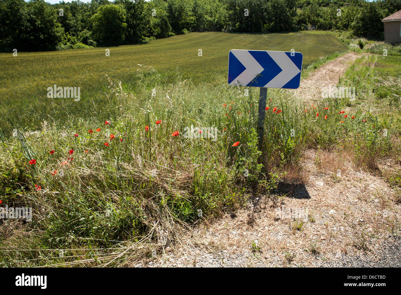 Chevron road bend sign hi-res stock photography and images - Alamy