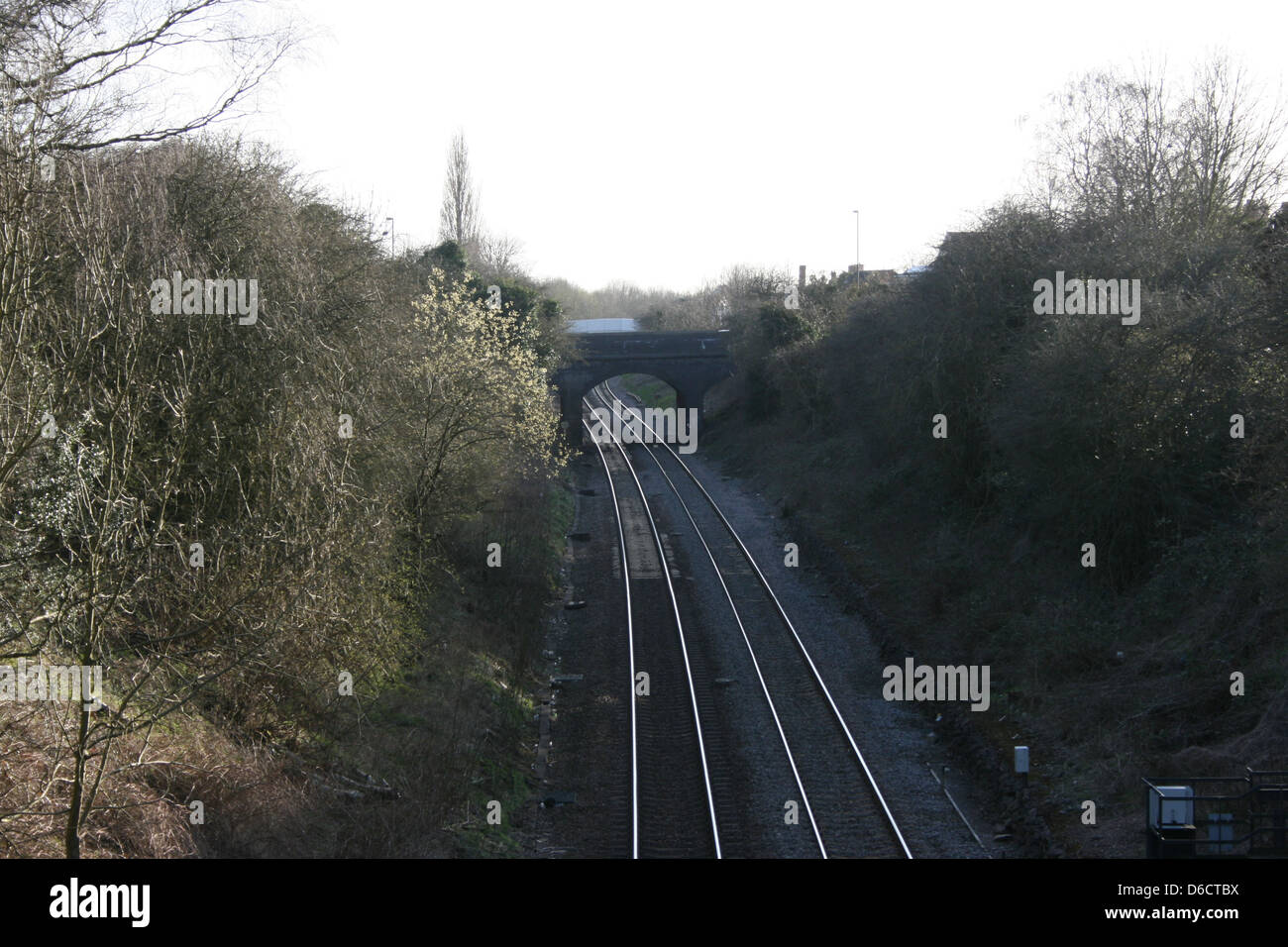 railway under an arched bridge Stock Photo - Alamy