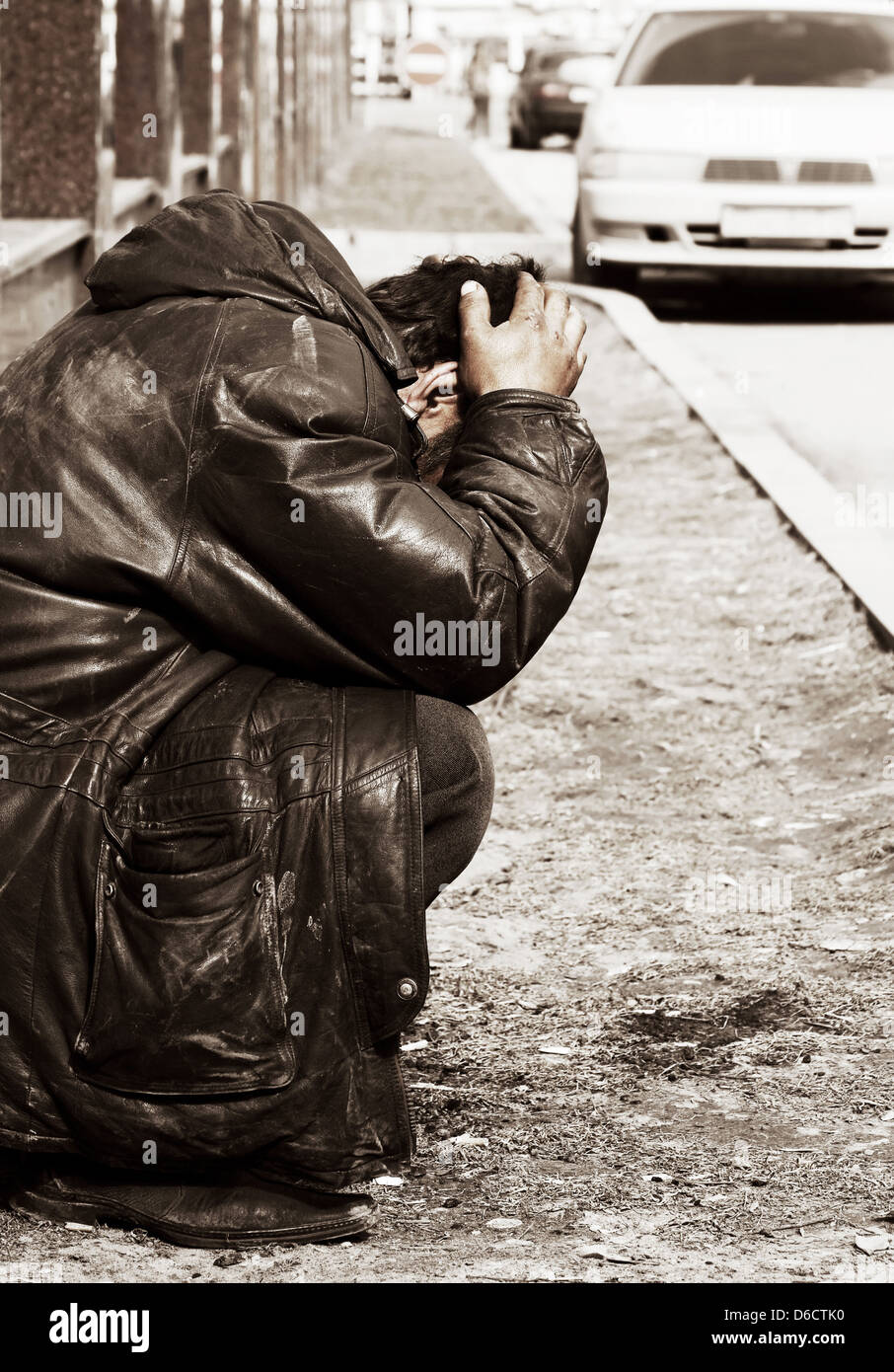 Homeless man in despair Stock Photo - Alamy