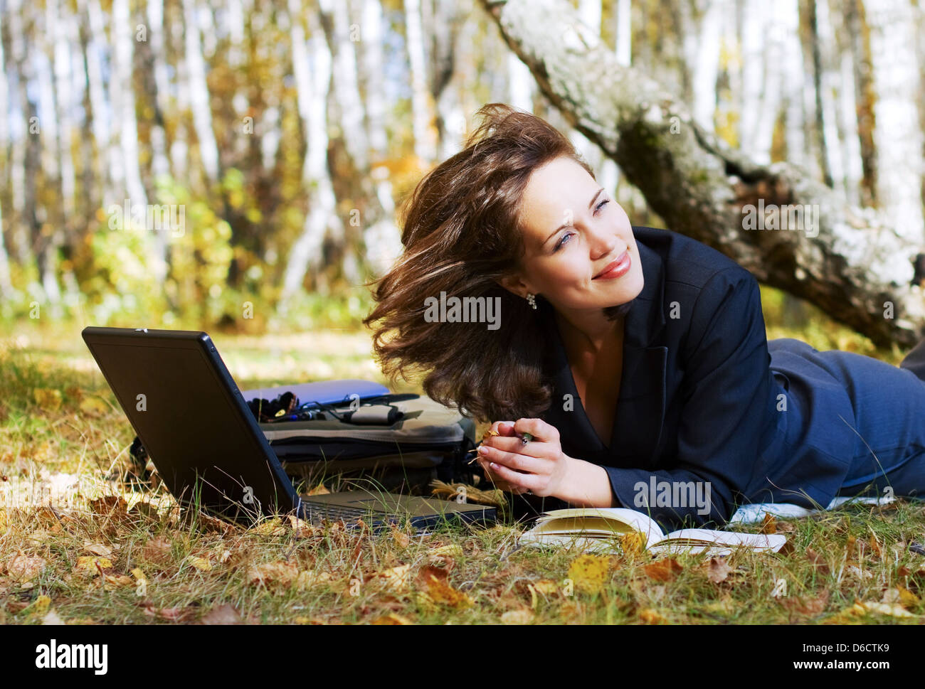 Businesswoman working on nature Stock Photo - Alamy