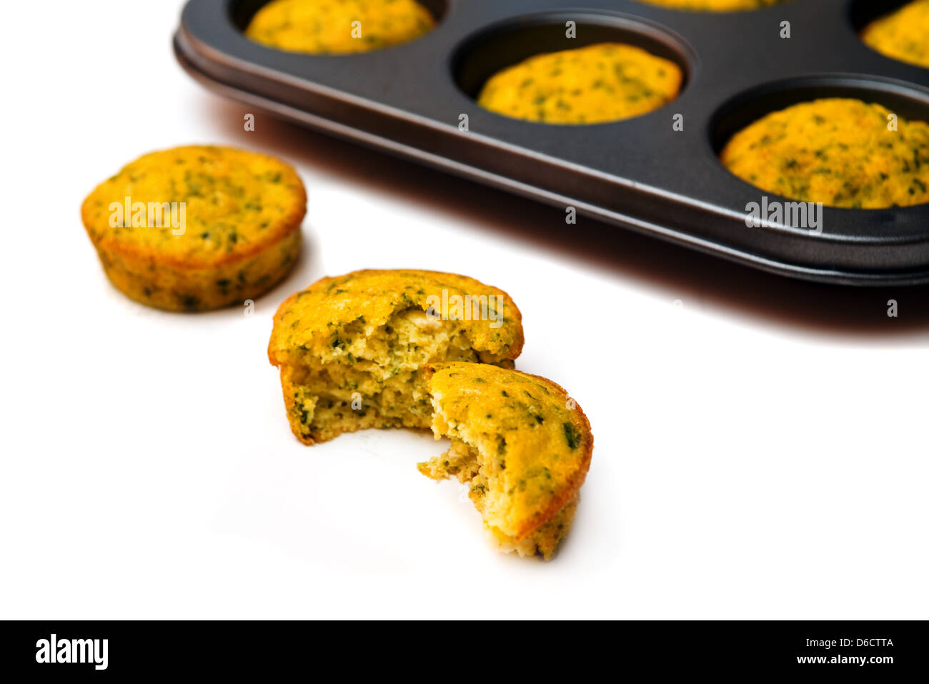 Pie mold with spinach pies over a white background Stock Photo - Alamy
