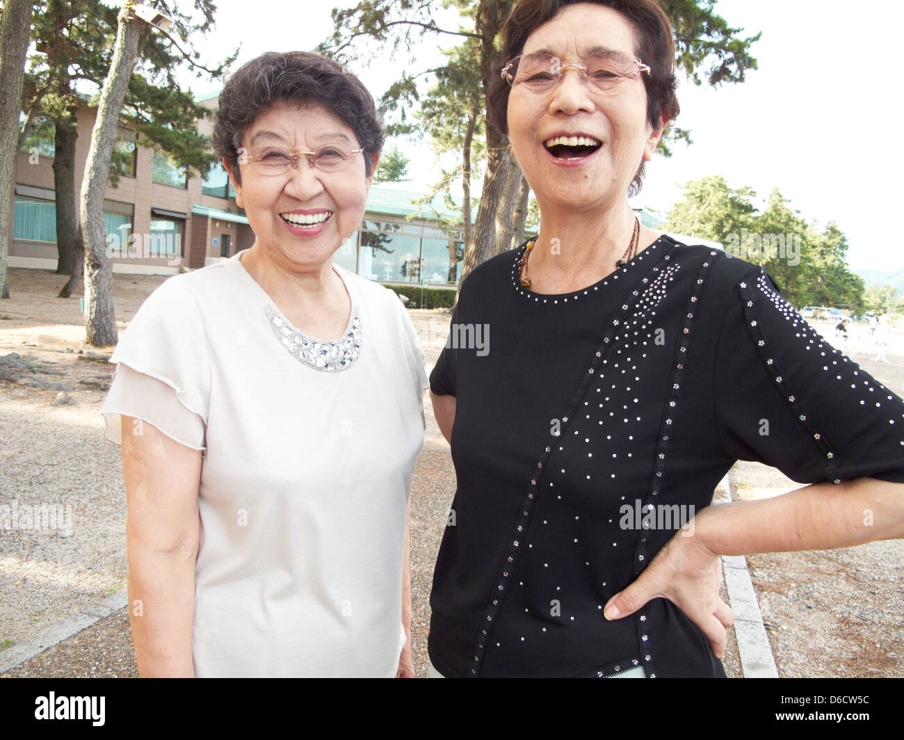 Two older senior women on road Stock Photo - Alamy